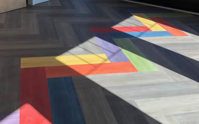 Colorful floors. Quiet hallways. -- Spaces4Learning